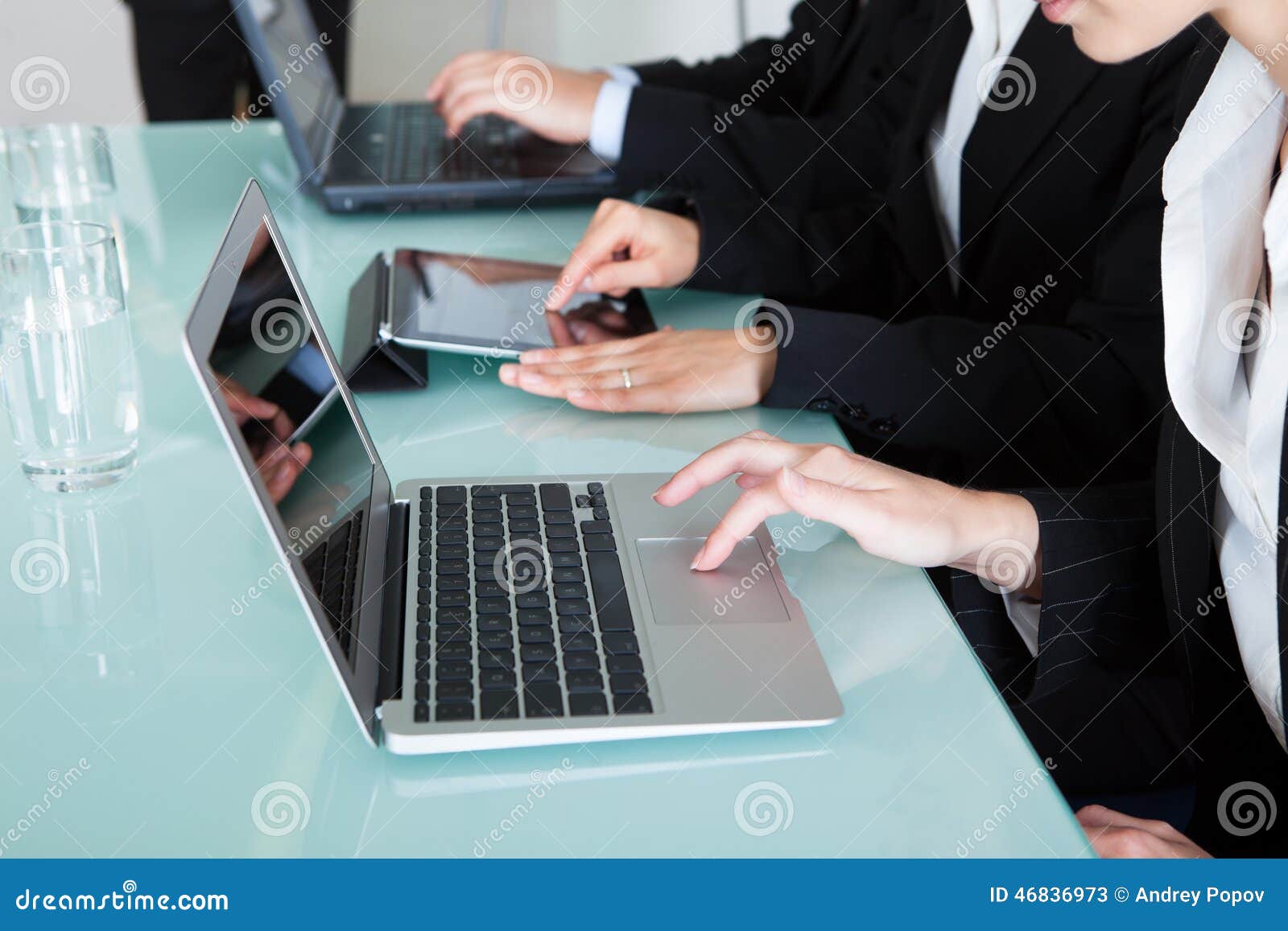 Businesspeople Working on Laptops and Tablets Stock Image - Image of ...