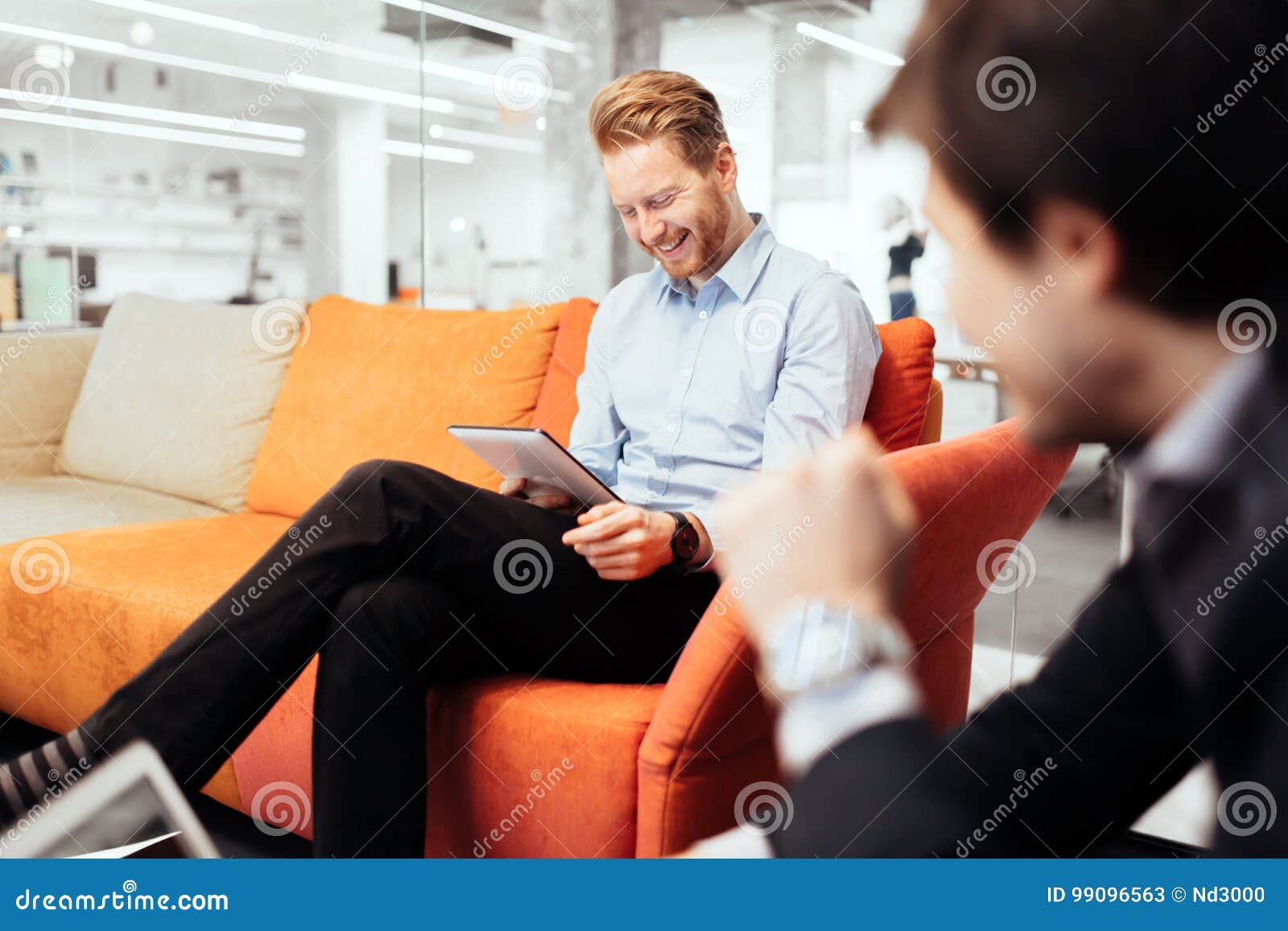 Businesspeople Working while Looking at Devices Stock Image - Image of ...