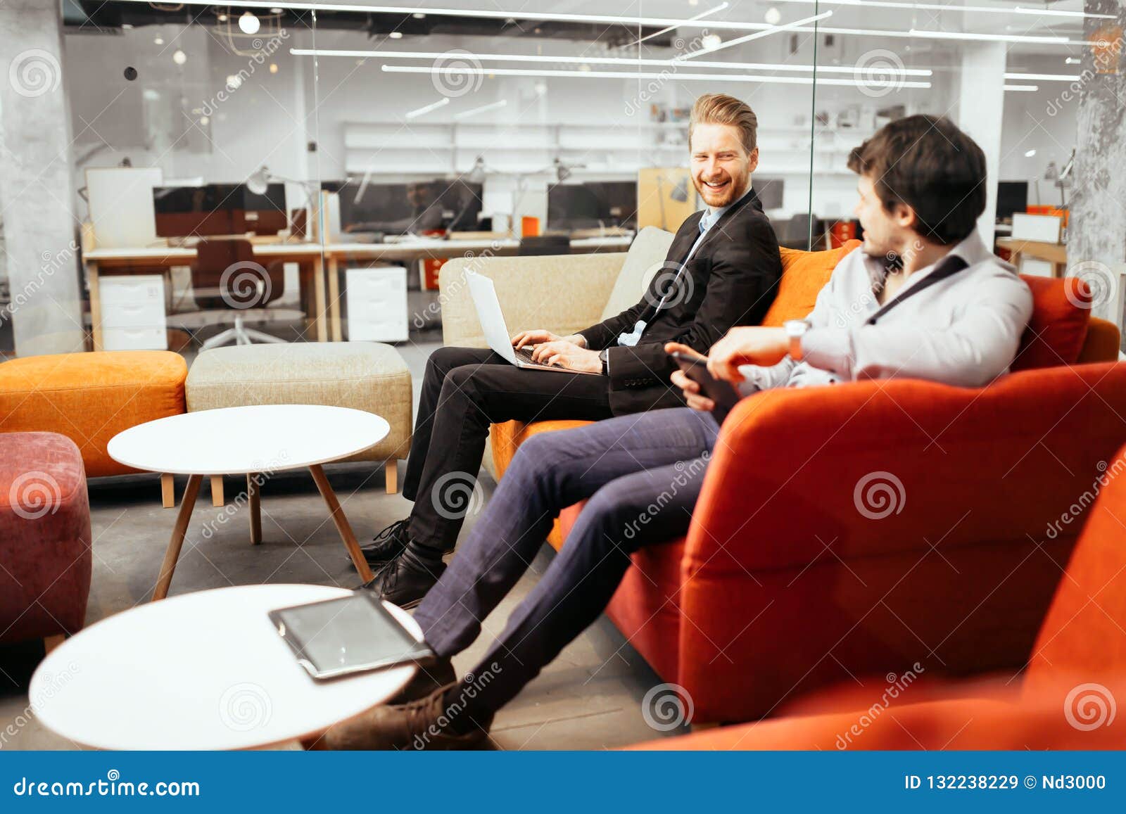 Businesspeople Working while Looking at Devices Stock Image - Image of ...