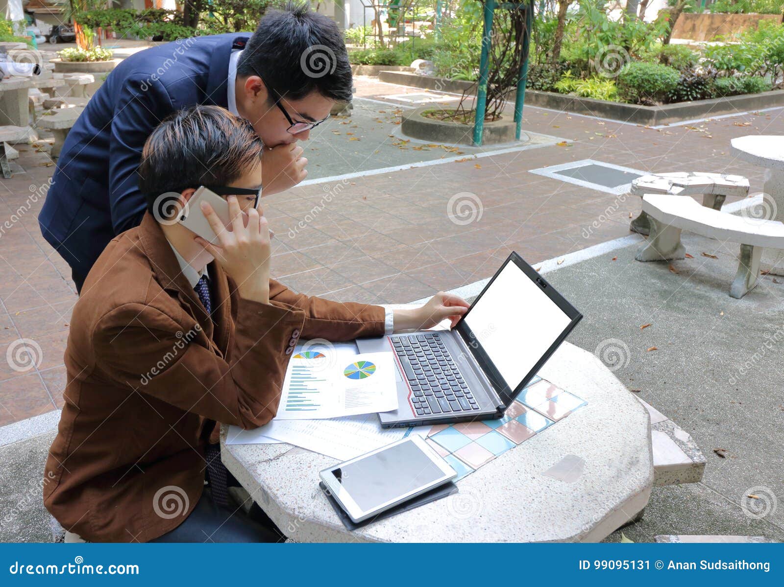 Businesspeople is Working Together at Public Outdoor. Stock Image ...