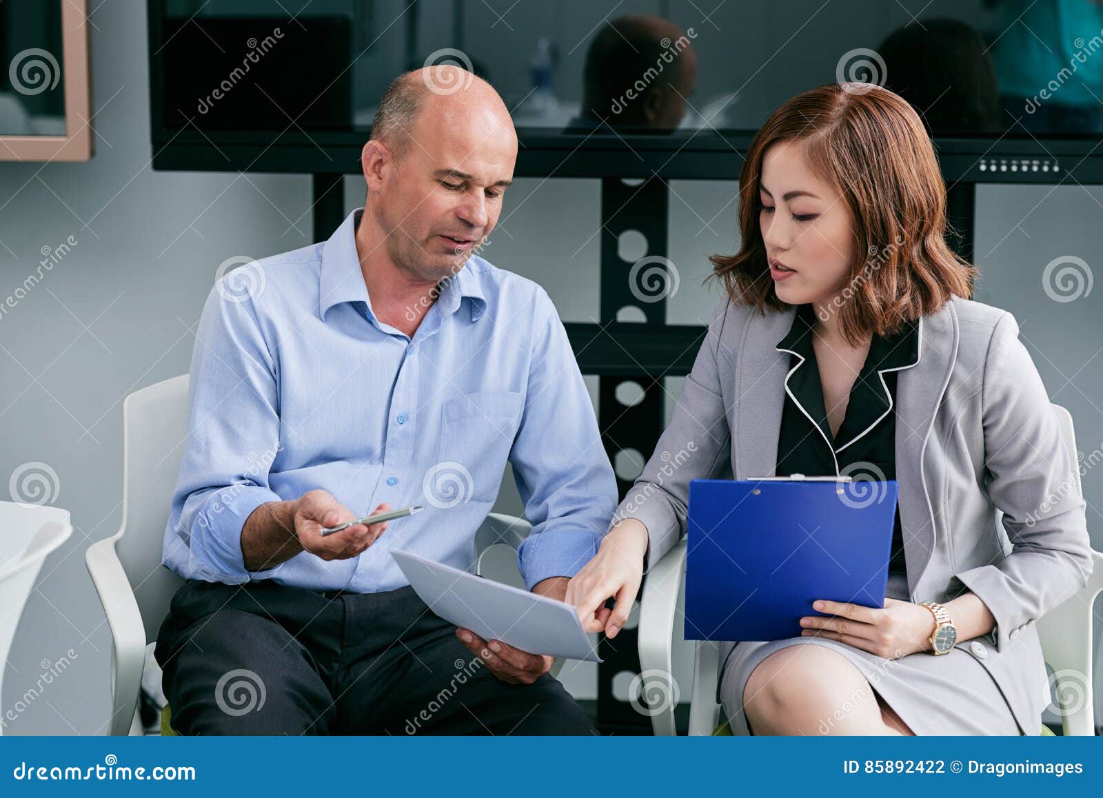 Businesspeople Wrapped Up in Work Stock Photo - Image of businesspeople ...
