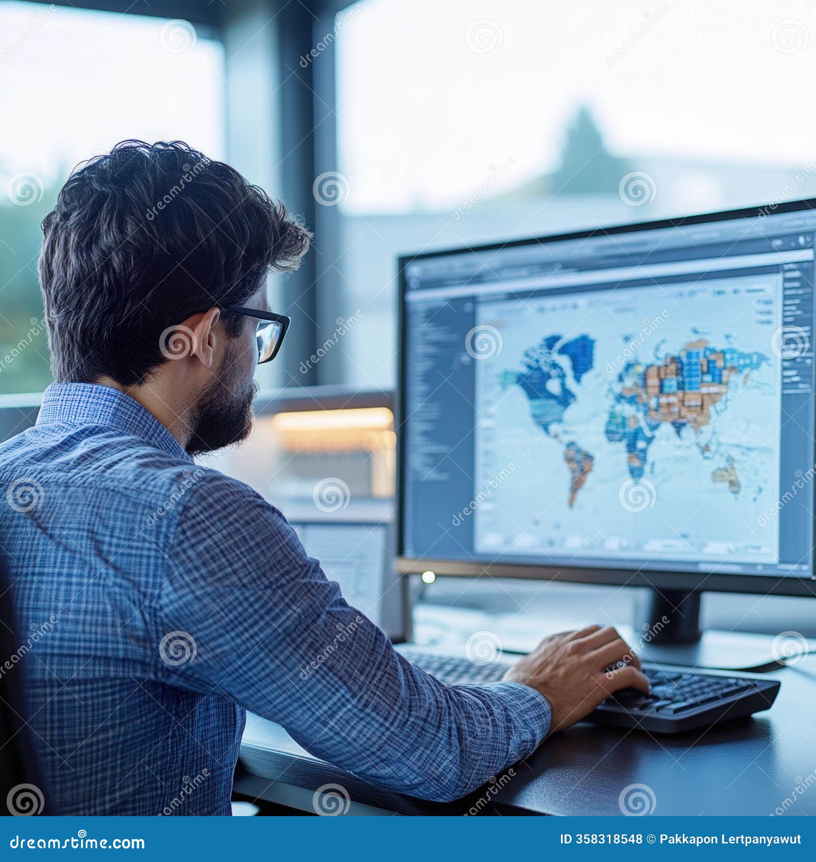 Businessperson Analyzing Logistics Report on Computer, Focused on Data ...