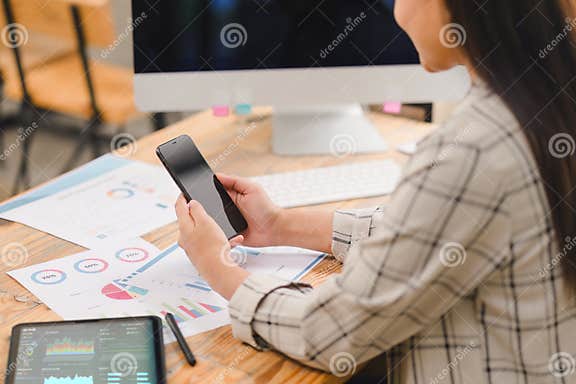 Businessperson Calculating Budget with Calculator and Analyzing ... Businessperson Calculating Budget with Calculator and Analyzing ...