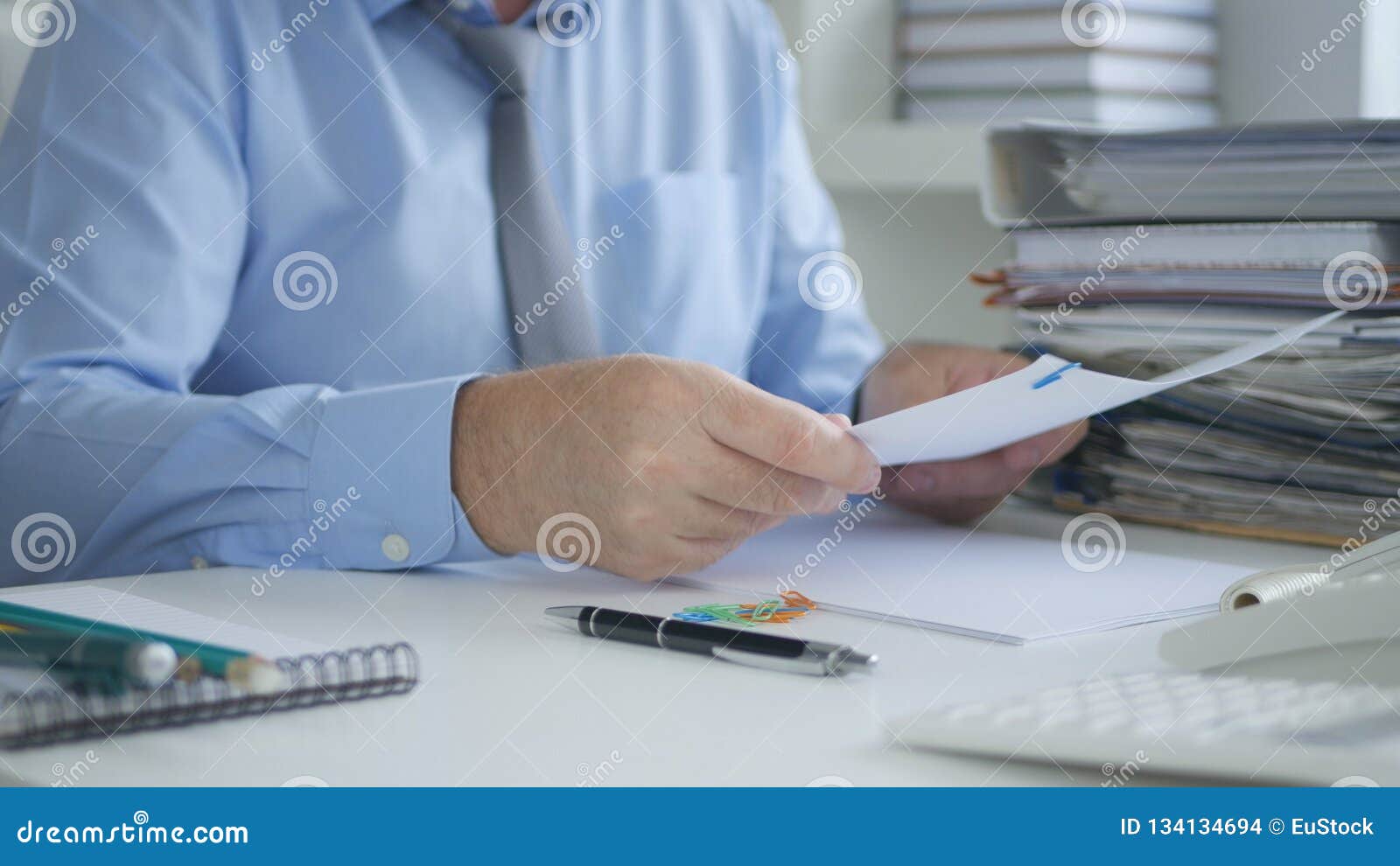 Businessperson Image Reading Accounting Documents and Invoices Stock ...