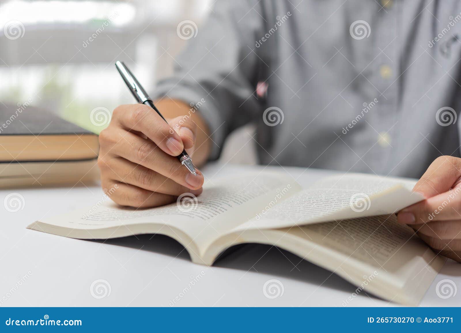 Businessperson Reading and Writing on Book.education Studying Knowledge ...