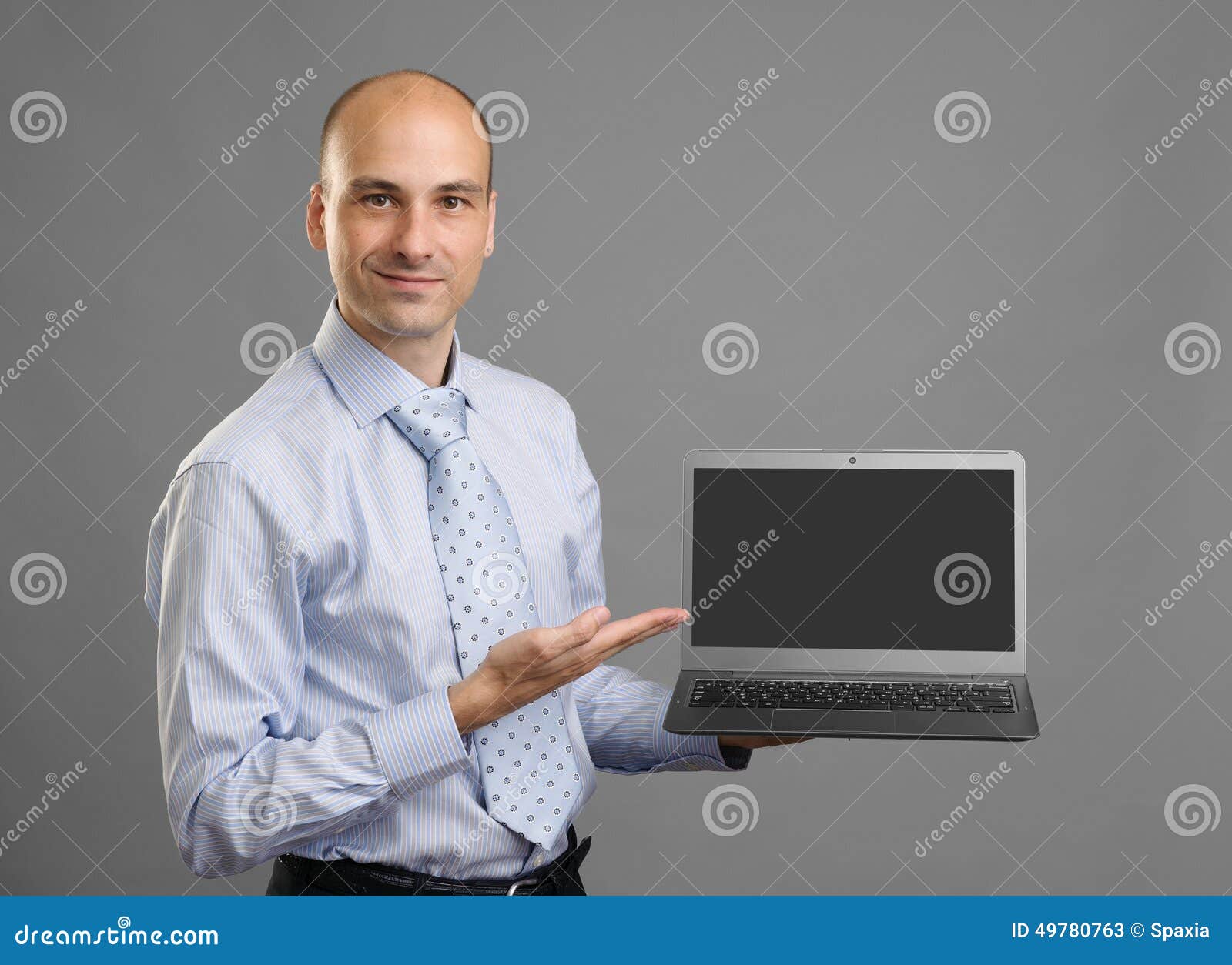 Businessperson Showing a Laptop with Blank Screen Stock Image - Image ...