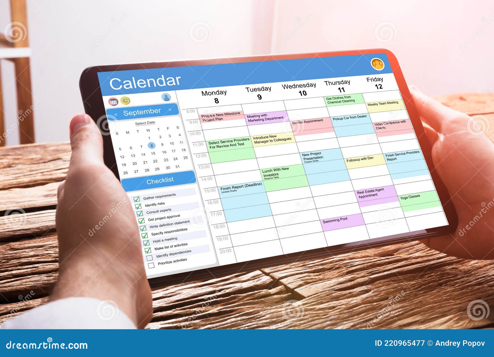 Executive Looking at Calendar on Tablet Computer Stock Image - Image of ...