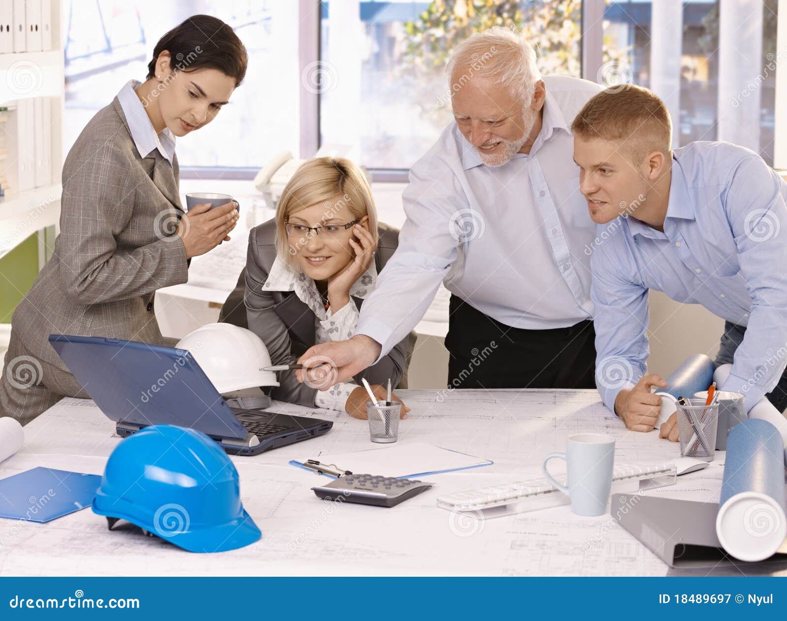 Businessteam Discussing Work on Laptop Stock Image - Image of ...