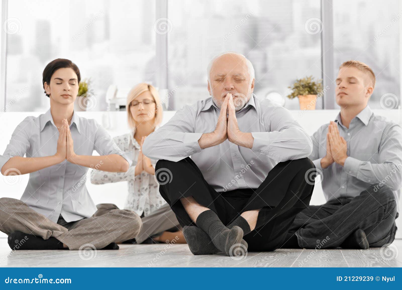 Businessteam Doing Yoga Meditation Stock Image - Image of eyes, floor ...