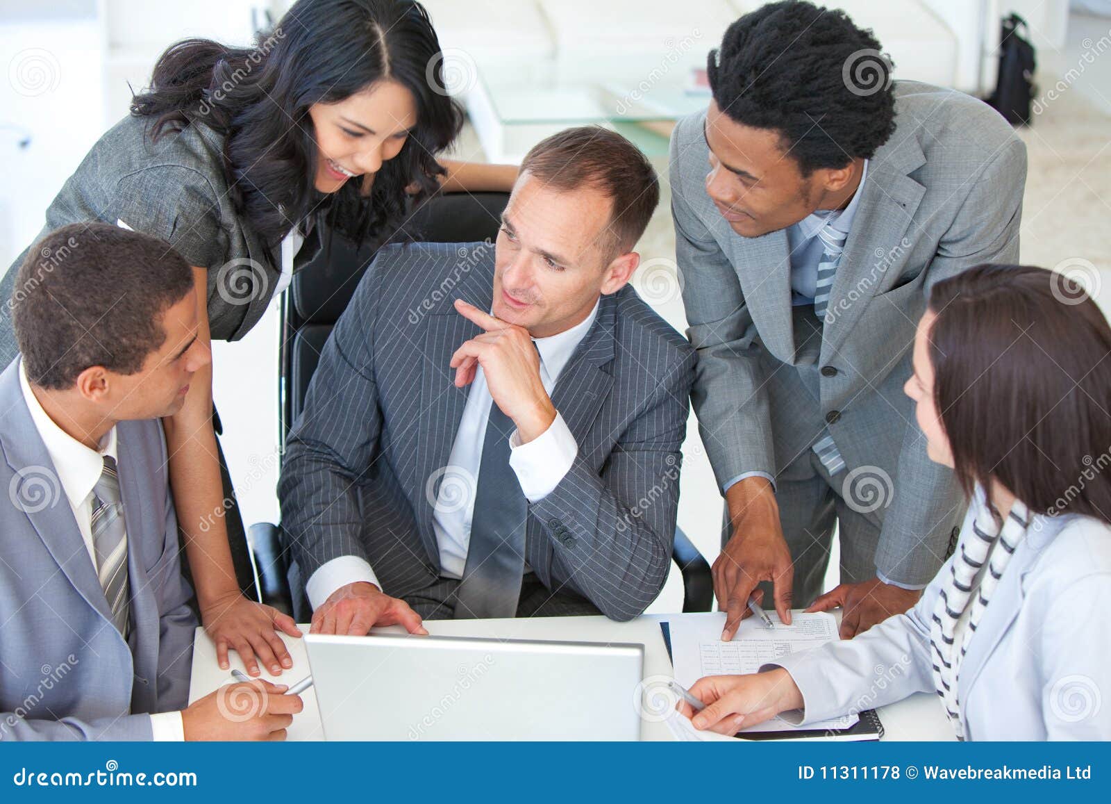 Businessteam Talking about a Project Stock Photo - Image of notebook ...