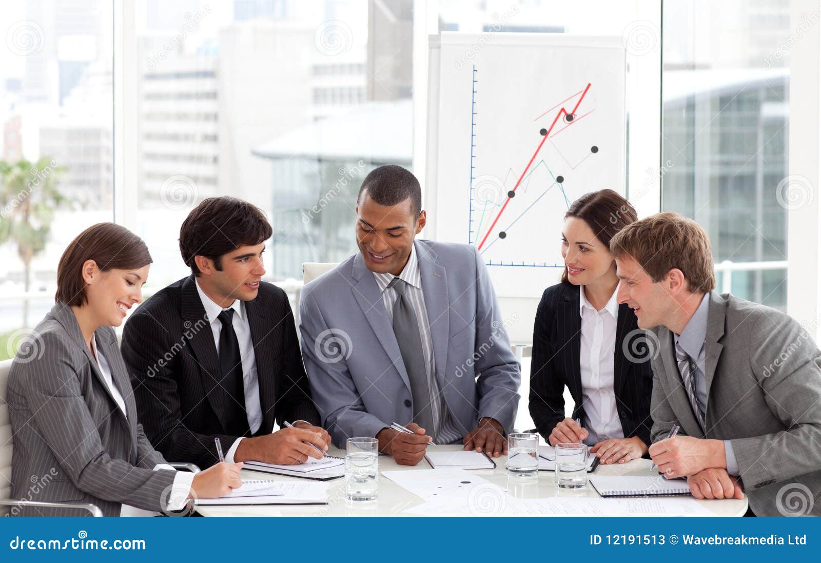 Businessteam Talking Taking Note during a Meeting Stock Image - Image ...