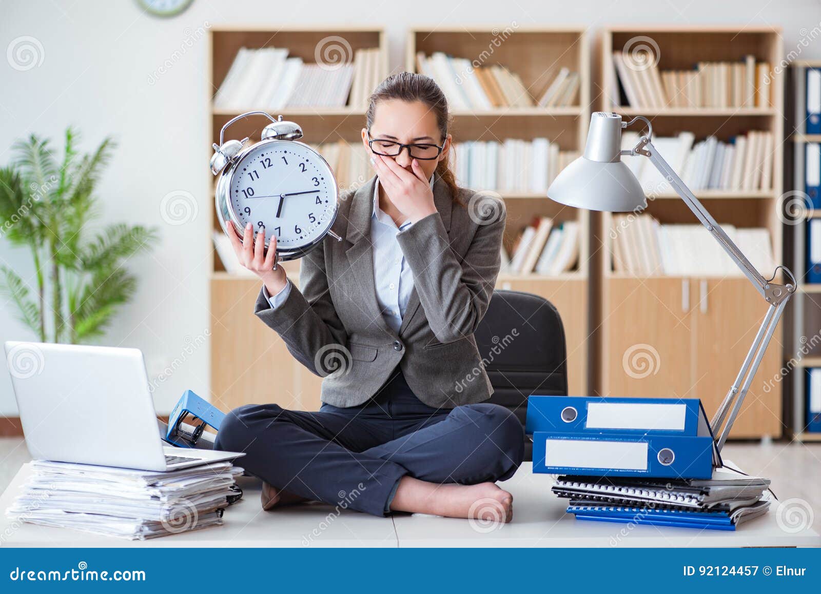 The Businesswoman with Alarm Clock in Office Stock Image - Image of ...
