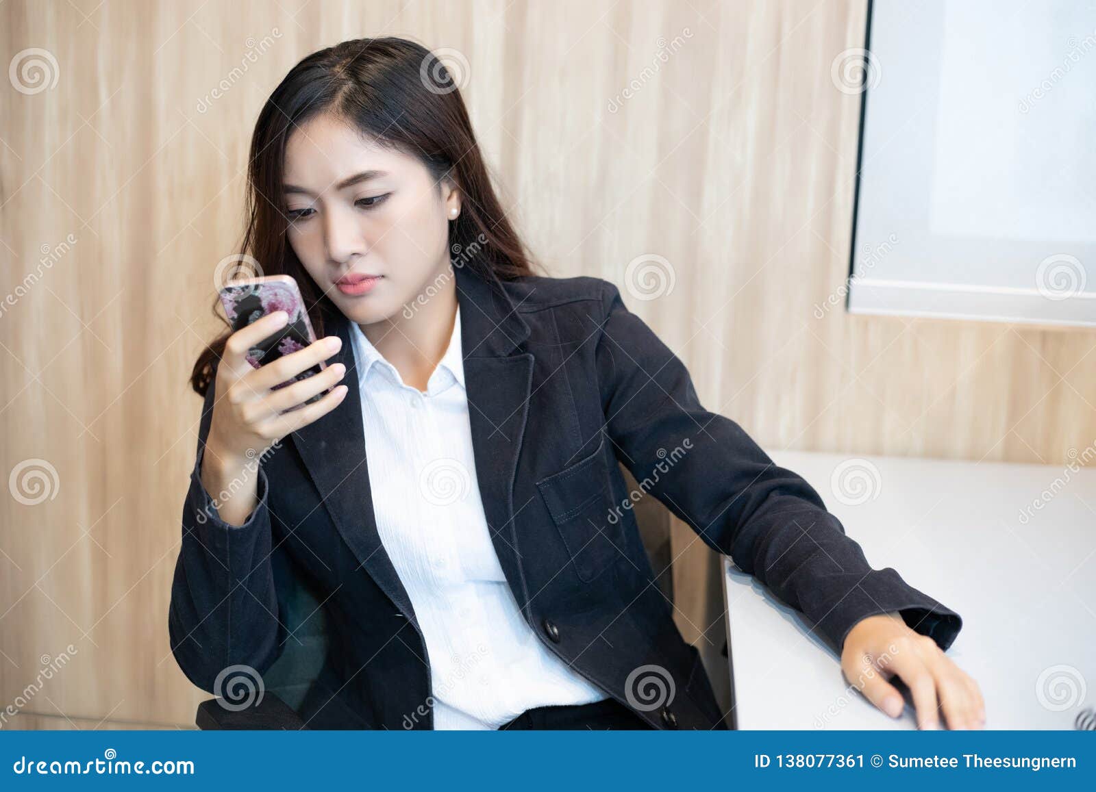 Businesswoman Asian Using Phone for Celling and Texting on Her Mobile ...
