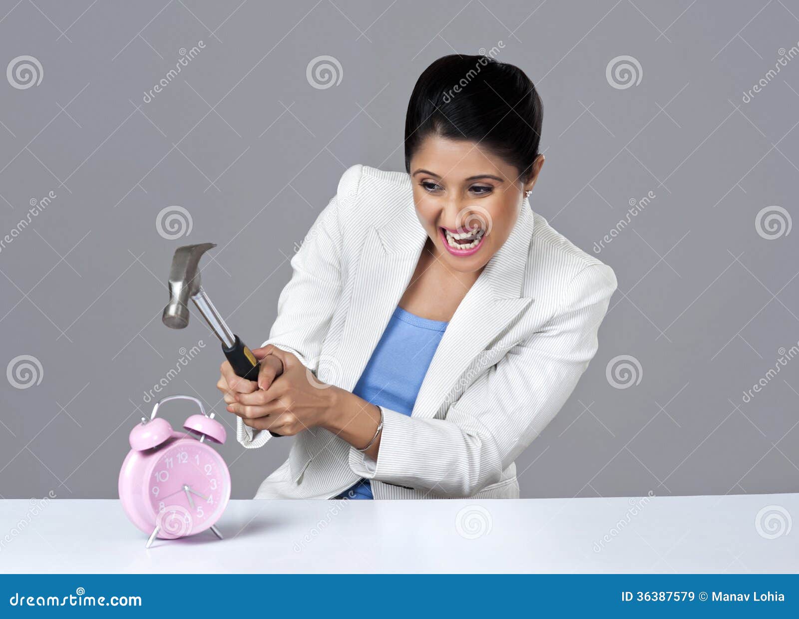 Businesswoman Breaking Alarm Clock Stock Image - Image of aggression ...