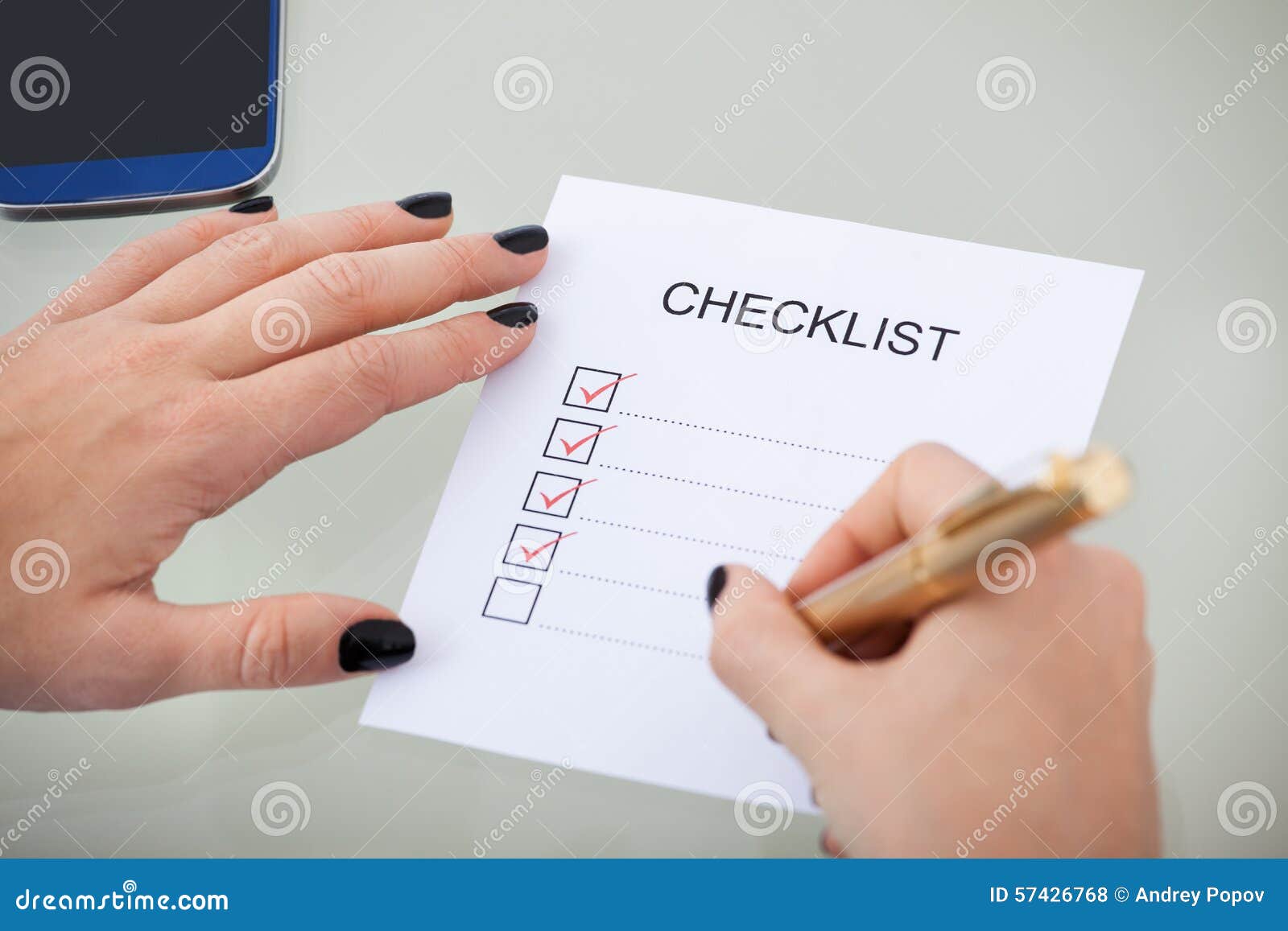 Businesswoman with Checklist at Desk Stock Photo - Image of ...