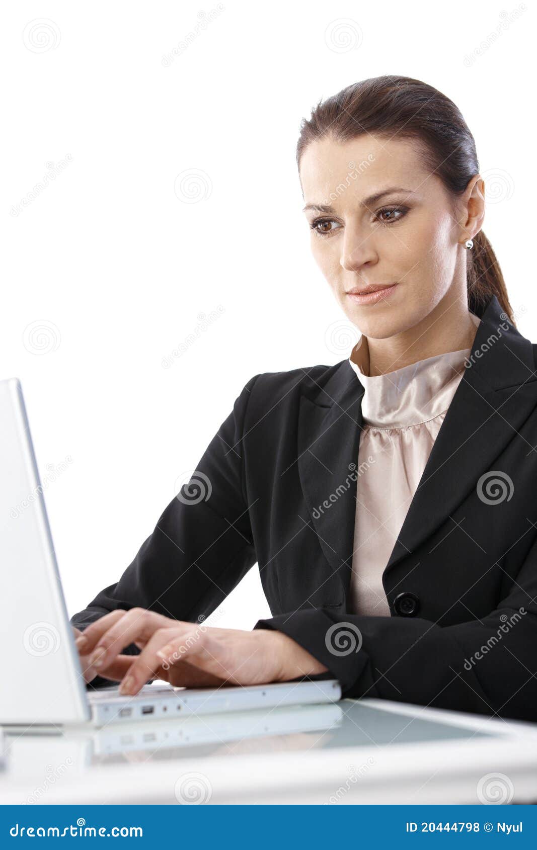 Businesswoman Concentrating on Work Stock Photo - Image of ...