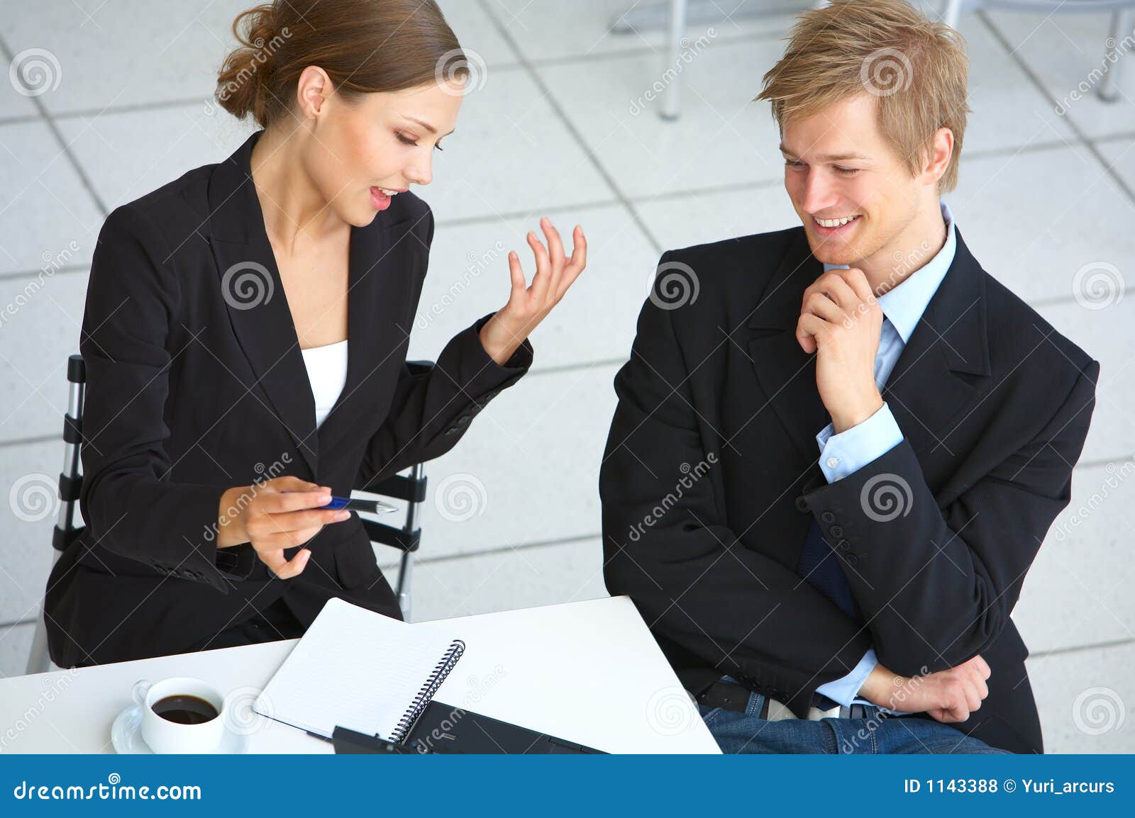 Businesswoman Consulting a Partner Stock Photo - Image of office ...