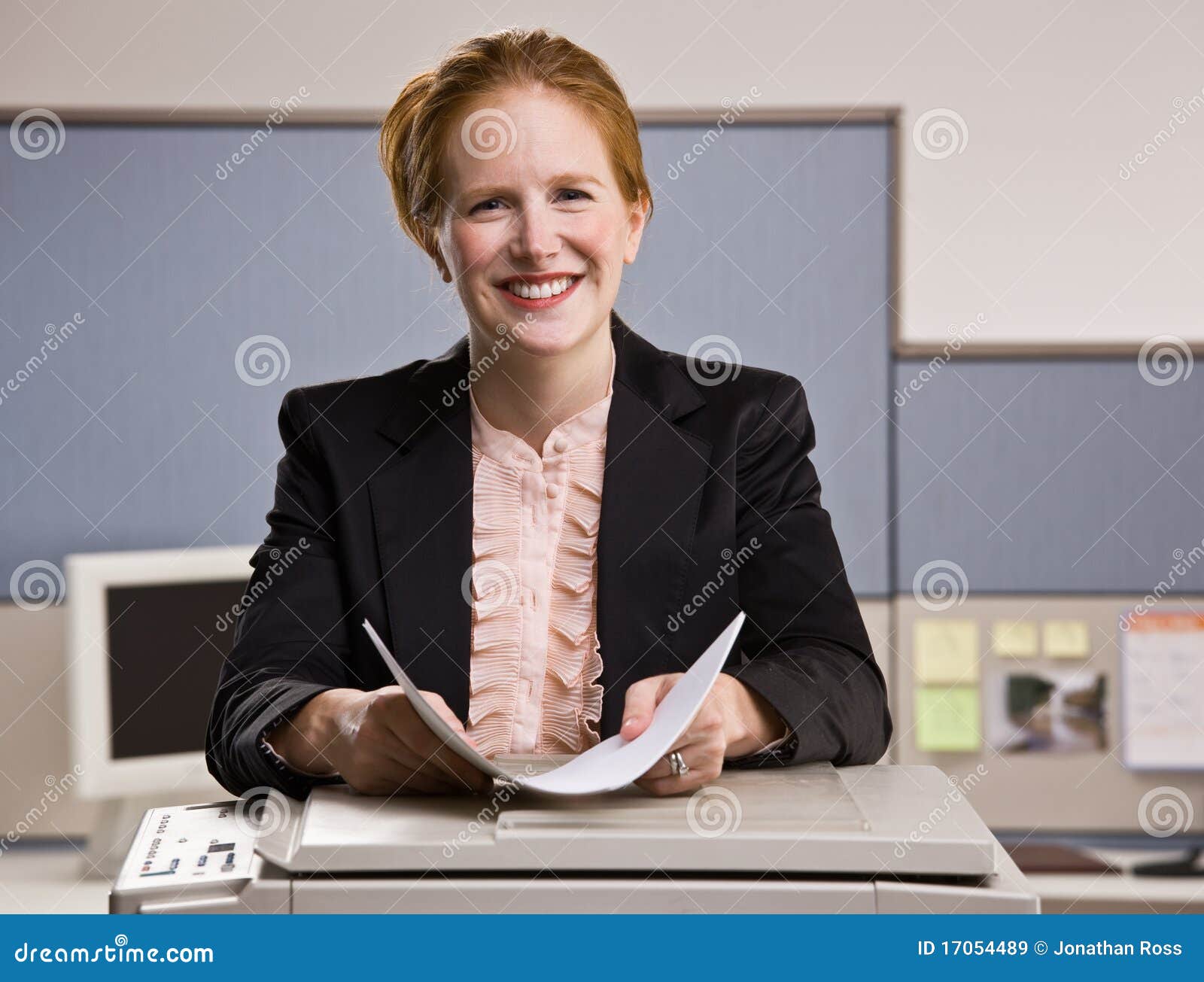 Businesswoman Copying Papers in Office Stock Image - Image of people ...