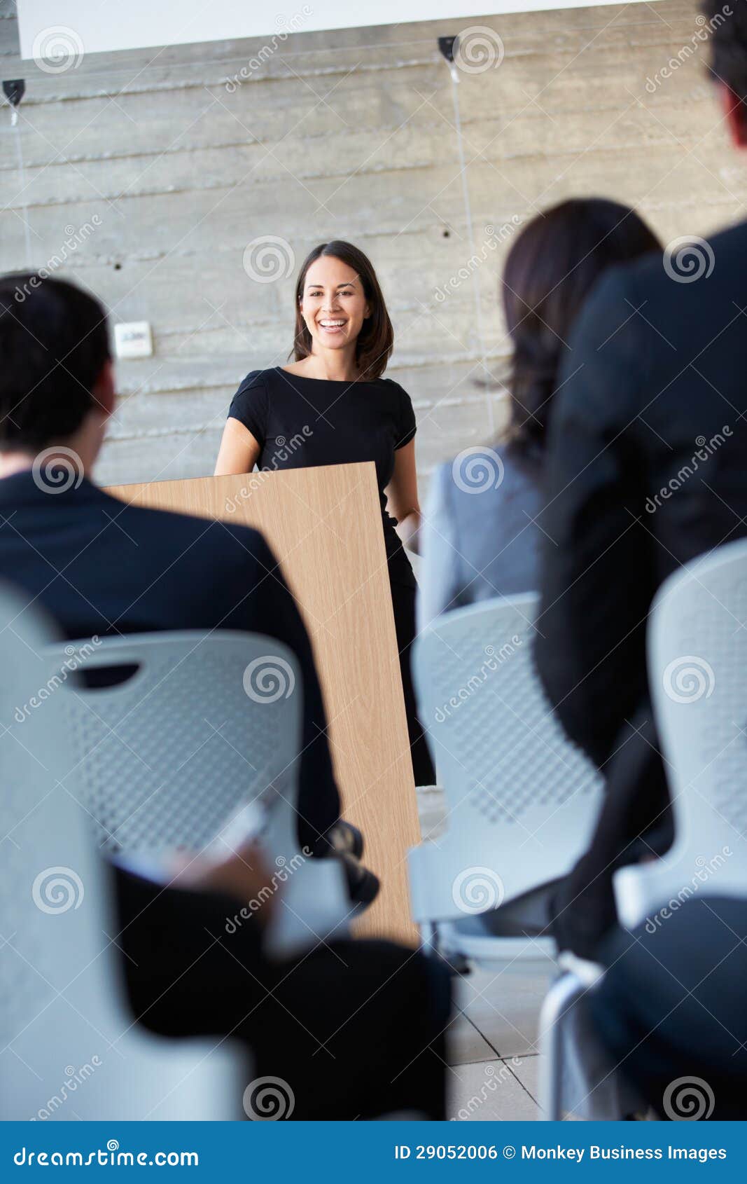 Businesswoman Delivering Presentation at Conference Stock Photo - Image ...
