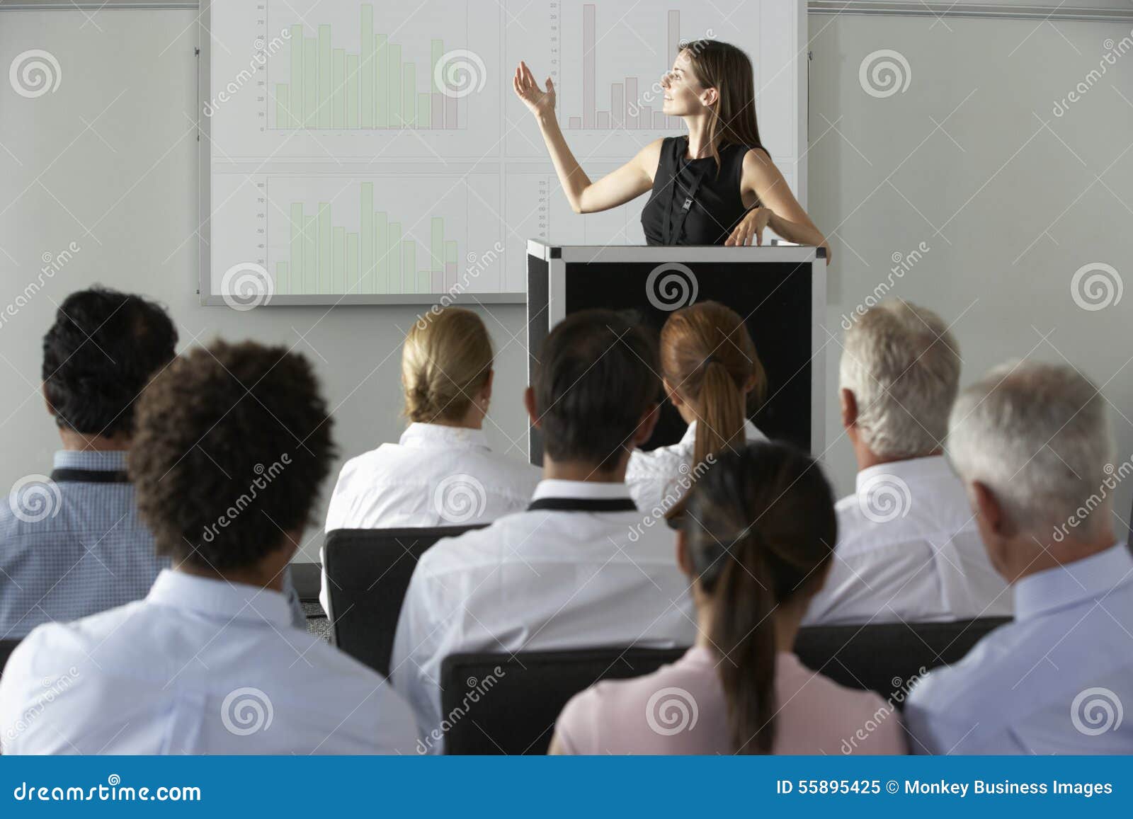 Businesswoman Delivering Presentation at Conference Stock Image - Image ...