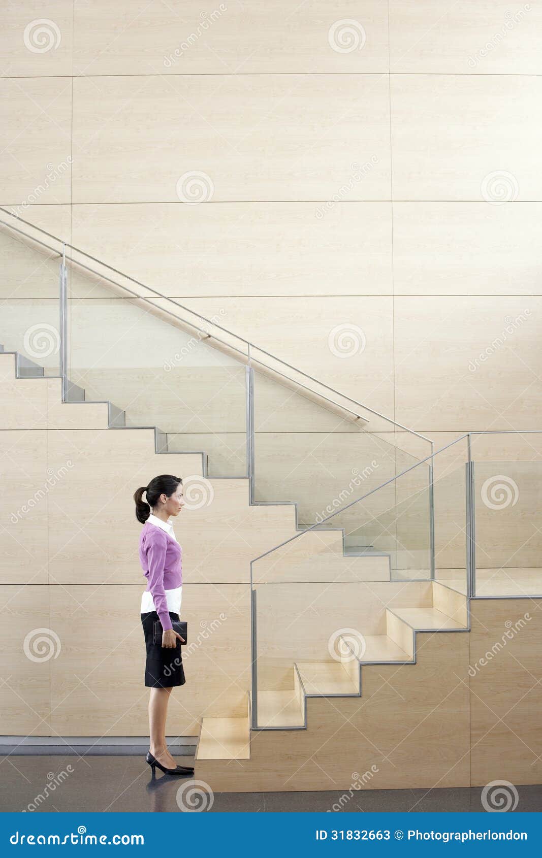 Businesswoman with Diary Standing in Front of Steps Stock Image - Image ...