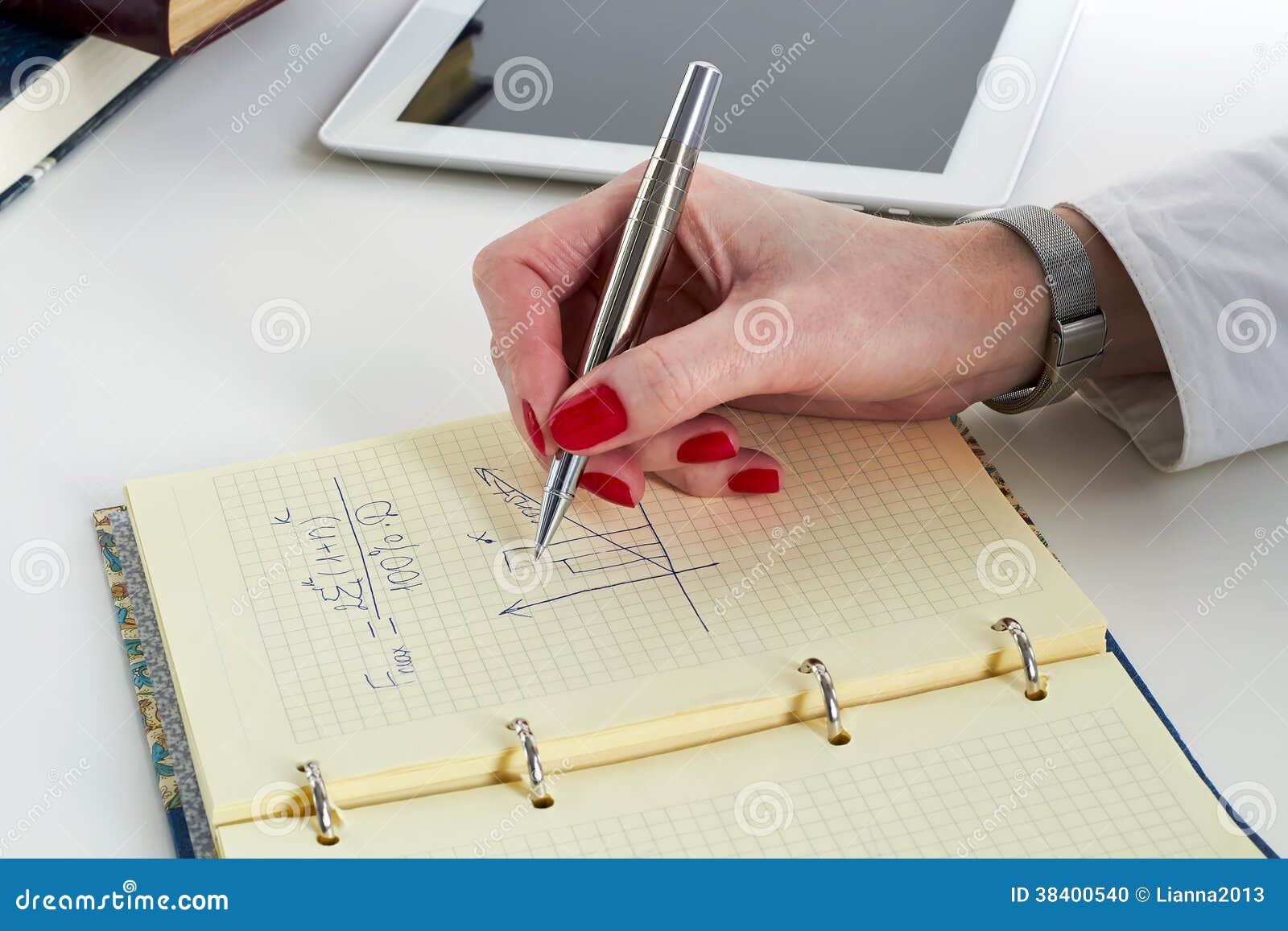 Businesswoman Doing Mathematical Calculations Stock Photo - Image of ...
