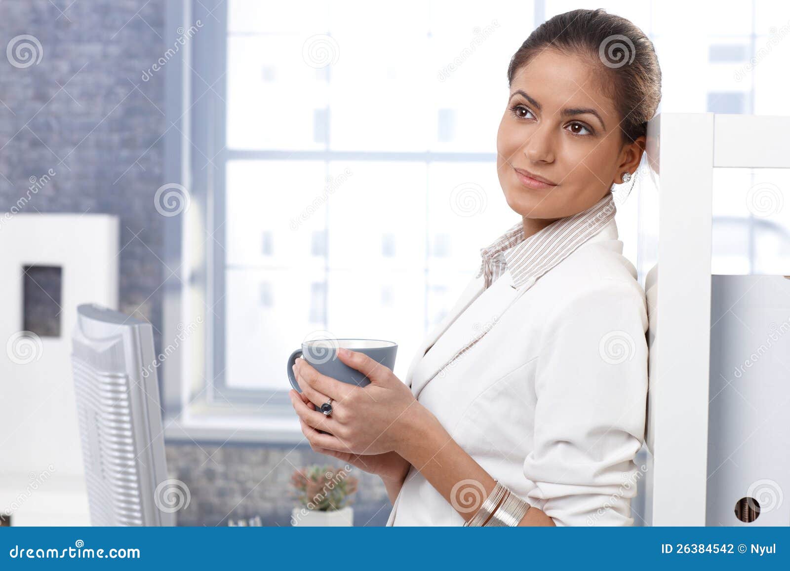 Businesswoman drinking tea stock photo. Image of consideration - 26384542