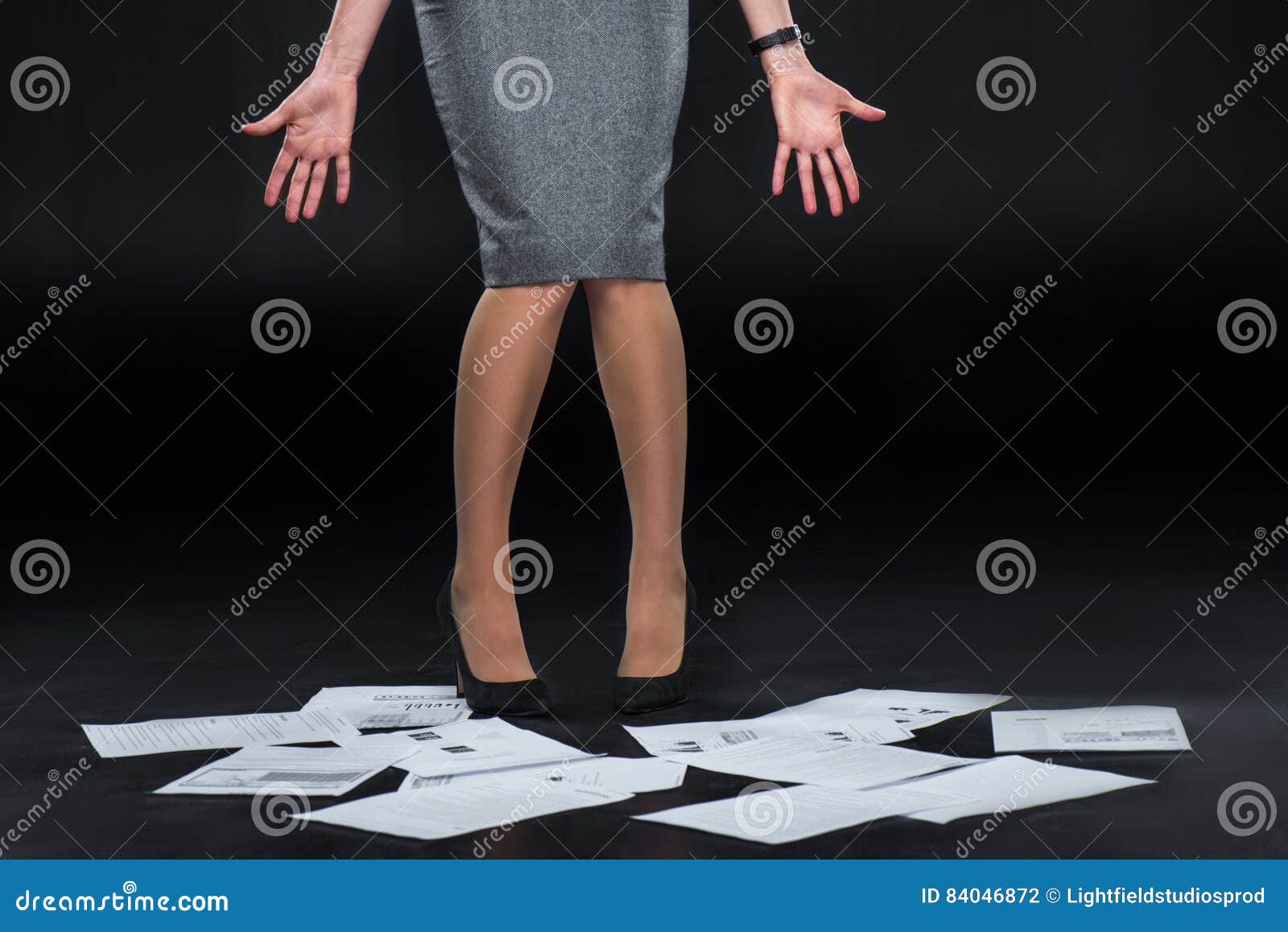 Businesswoman with Dropped Documents Stock Photo - Image of black ...