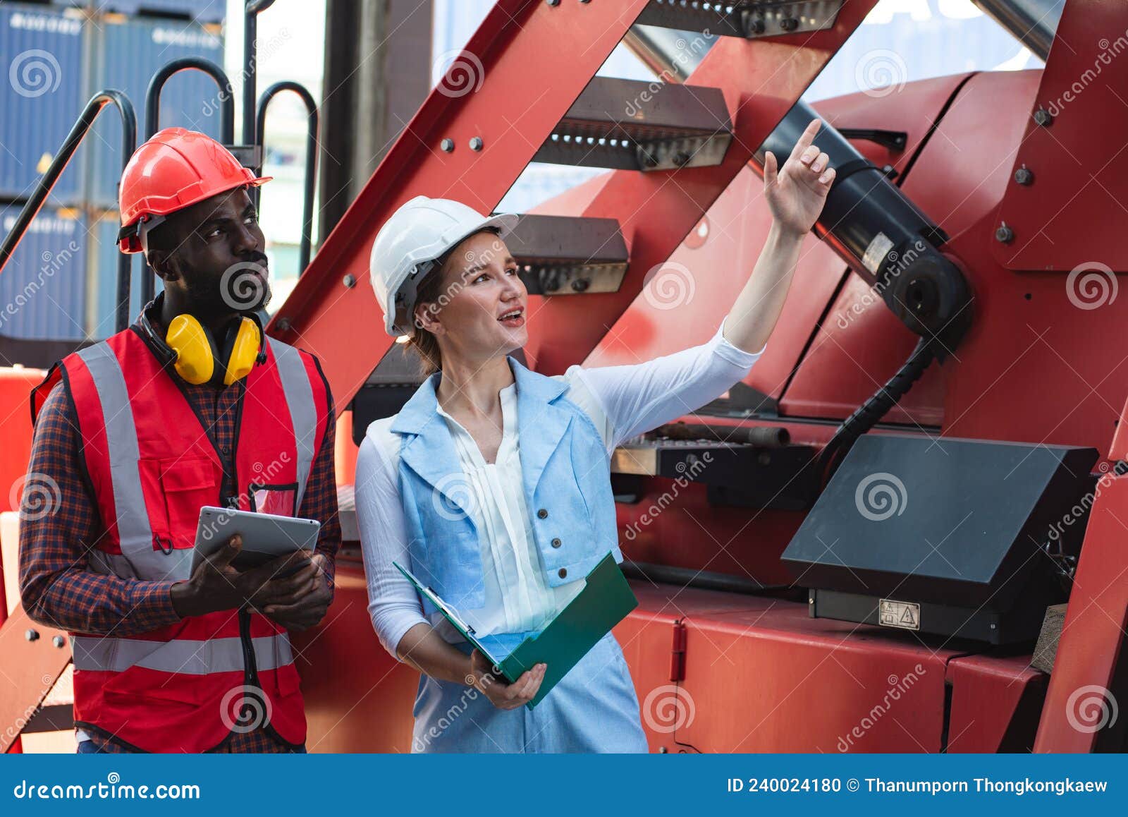 Businesswoman and Engineer Talking and Checking Loading Containers Box ...