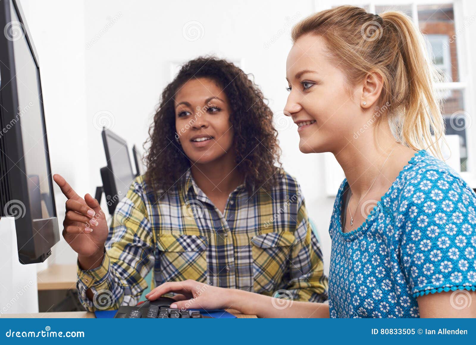 Businesswoman Giving Computer Training in Office Stock Image - Image of ...