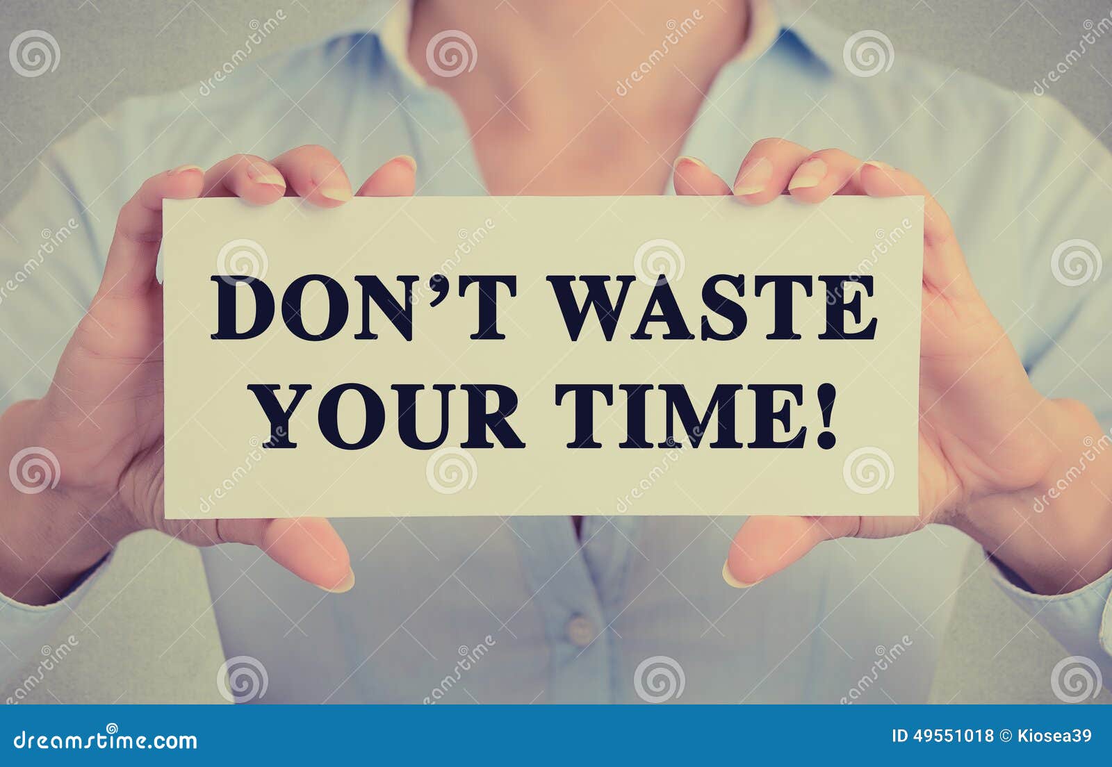 Businesswoman Hands Holding Card Sign with Don T Waste Your Time ... Businesswoman Hands Holding Card Sign with Don T Waste Your Time ...