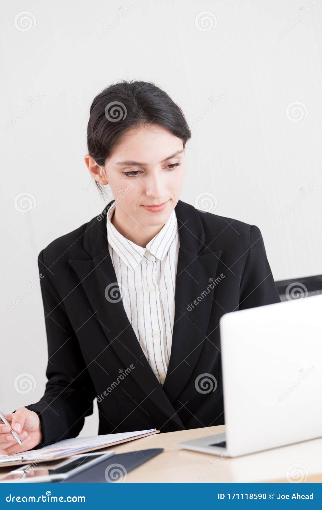 A Businesswoman Has Working with Concentrate and Happiness Stock Photo ...