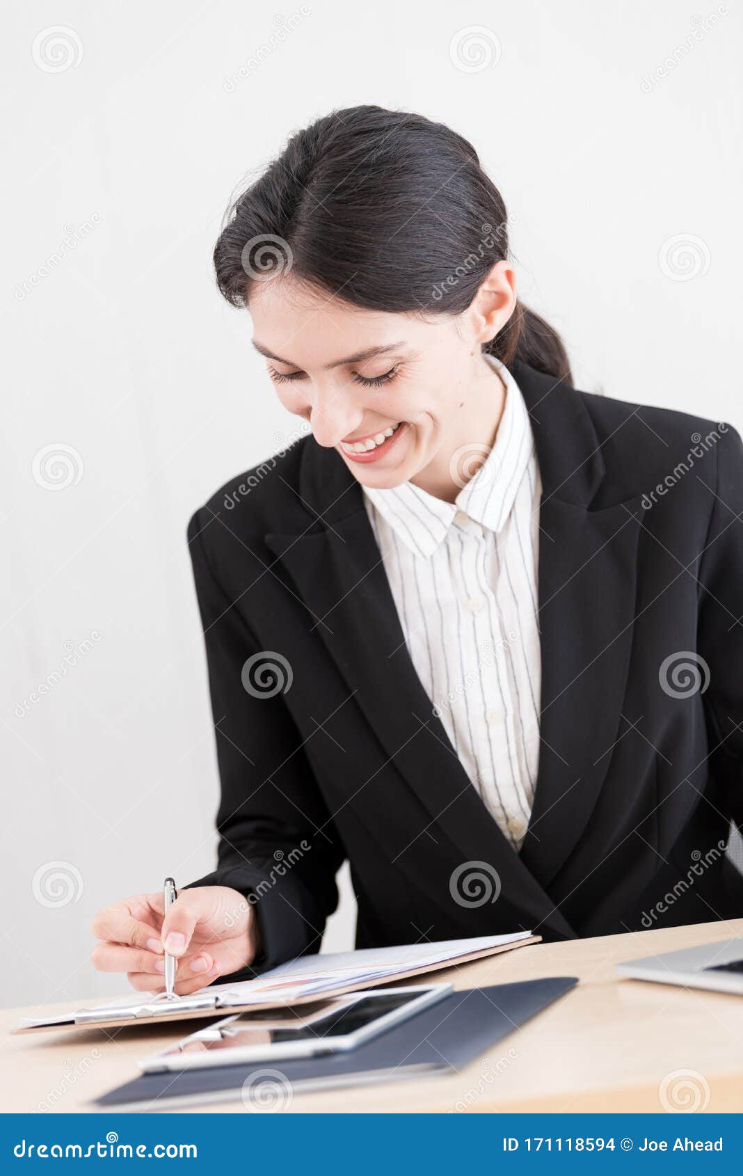 A Businesswoman Has Working with Concentrate and Happiness Stock Photo ...