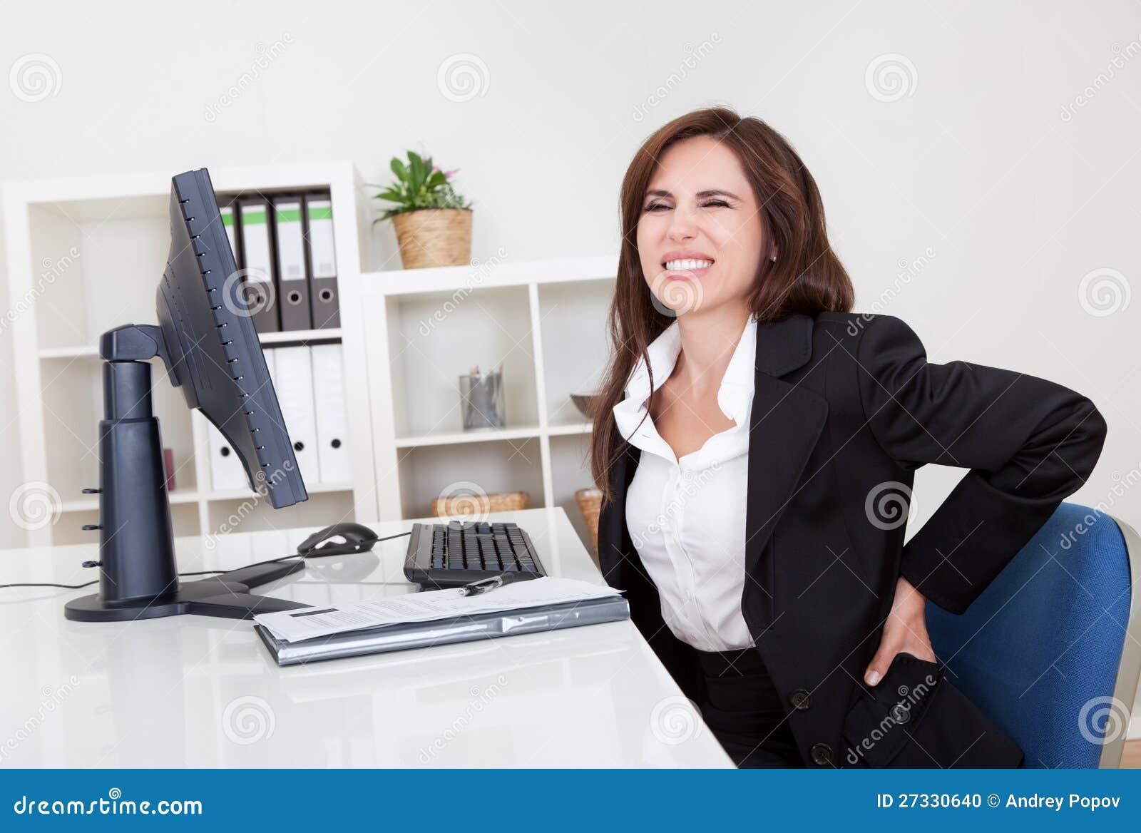 Businesswoman Having Backache at Work Stock Photo - Image of formal ...