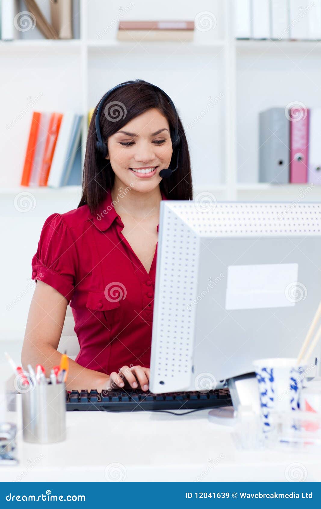 Businesswoman with Headset on at a Computer Stock Image - Image of ...