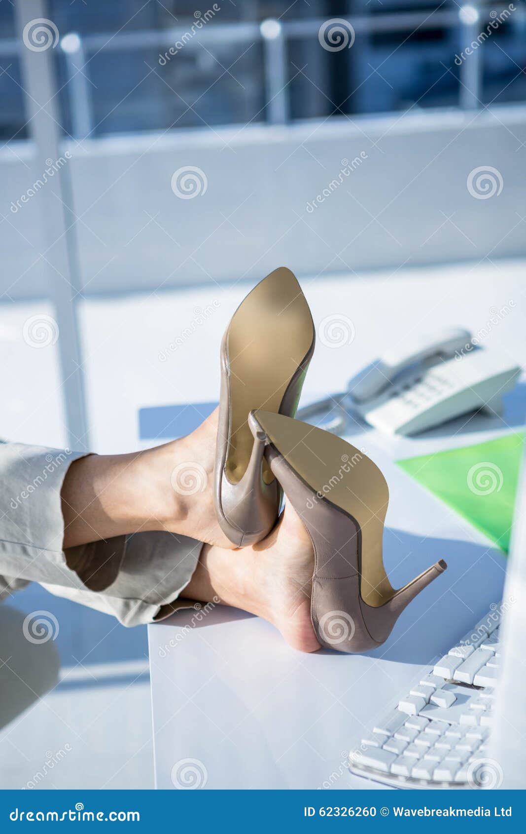 Businesswoman with Her Legs on Her Desk Stock Photo - Image of ...