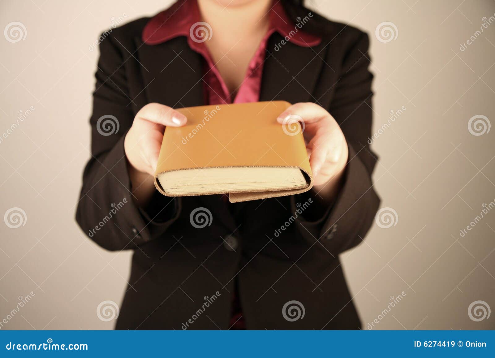 Businesswoman holding book stock image. Image of leather - 6274419