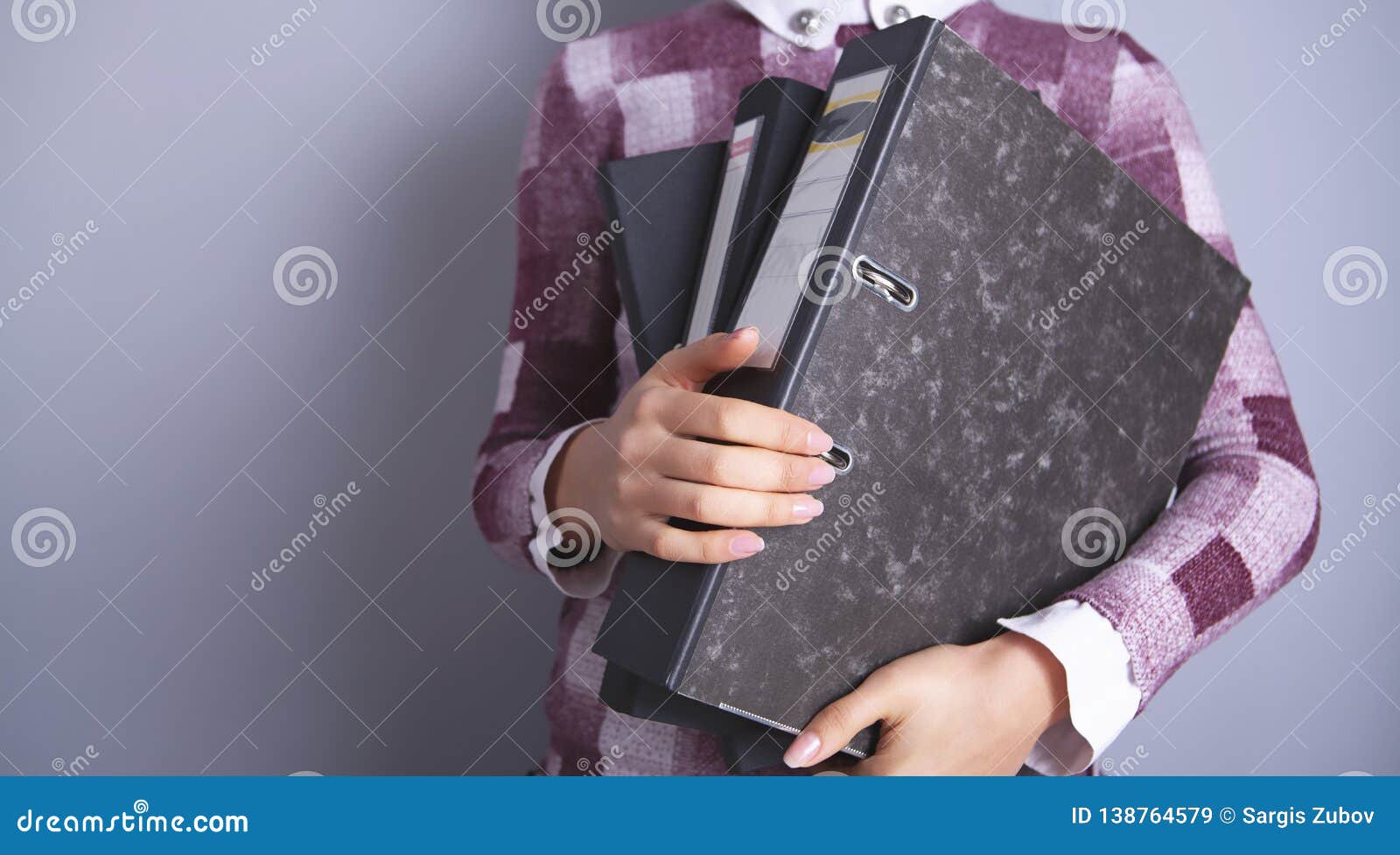 Businesswoman Holding Folders Stock Image - Image of lady, file: 138764579