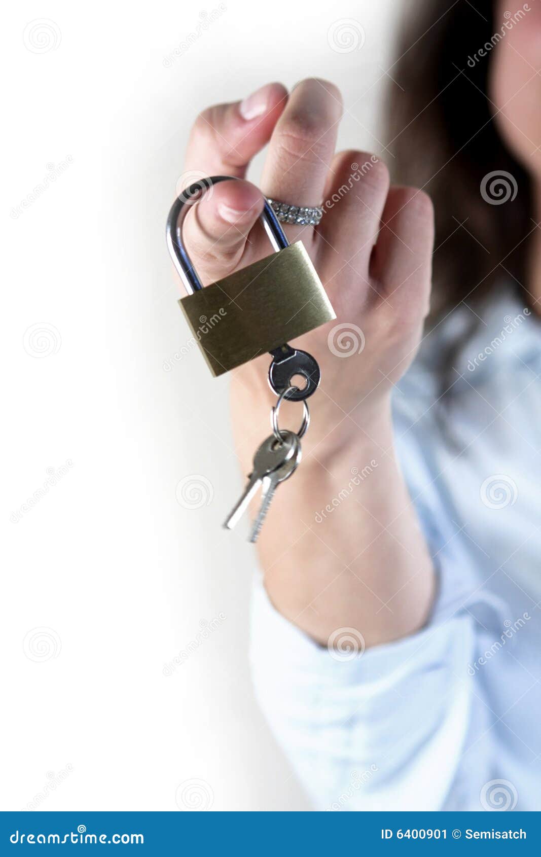 Businesswoman holding lock stock image. Image of elegance - 6400901