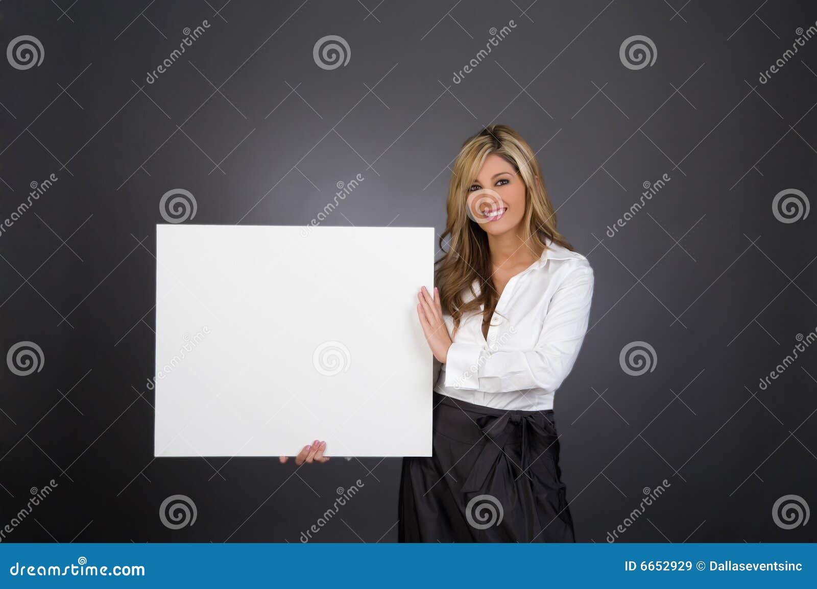 Businesswoman holding sign stock image. Image of brunette - 6652929