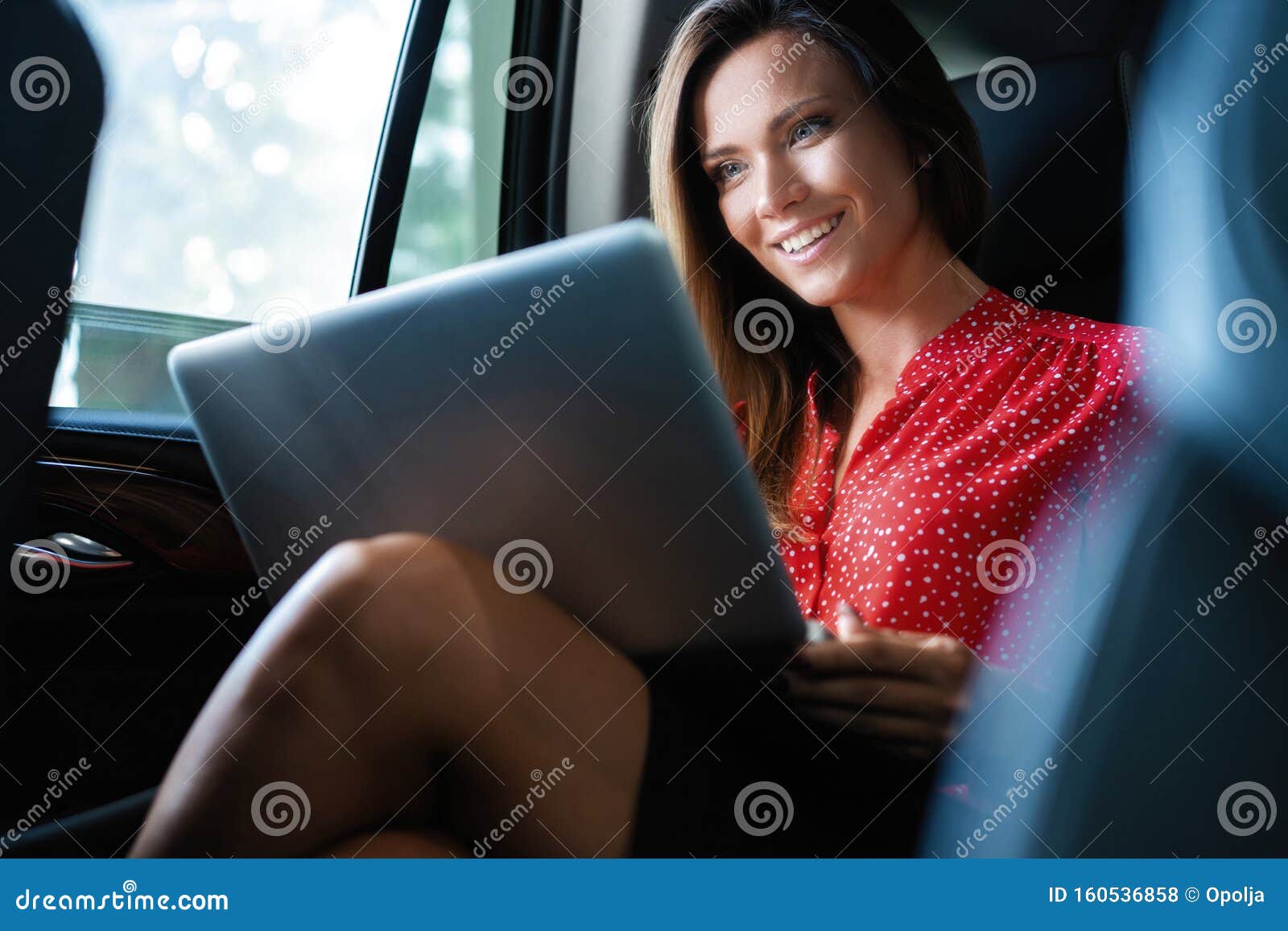 Businesswoman Inside Her Car Using a Laptop. Stock Photo - Image of ... Businesswoman Inside Her Car Using a Laptop. Stock Photo - Image of ...