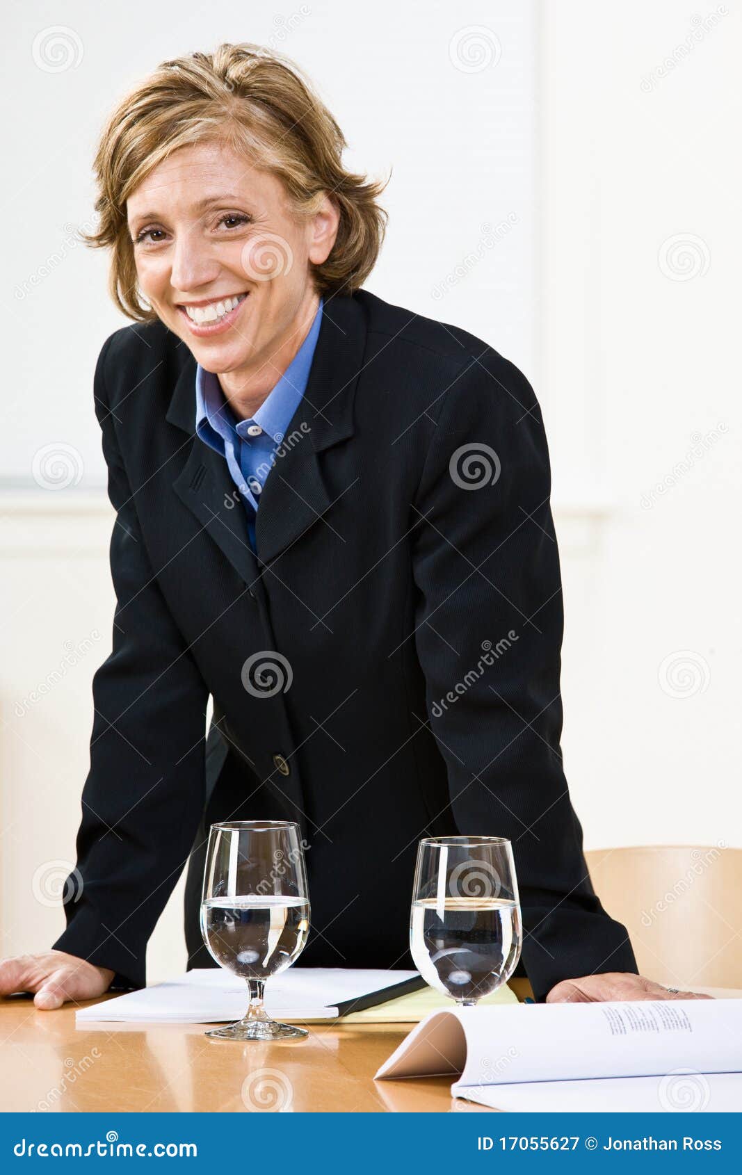 Businesswoman Leaning on Table Stock Image - Image of person, adult ...