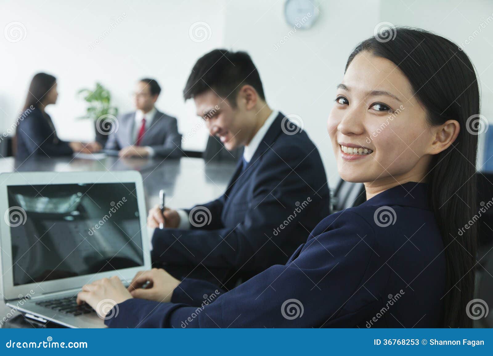 Businesswoman Looking Over Her Shoulder at the Camera Stock Image ...