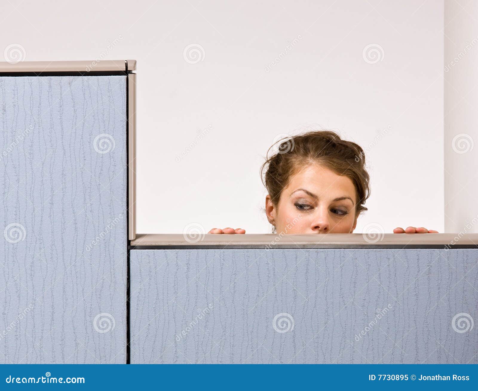 Businesswoman Peering Over Cubicle Wall Stock Image - Image of wall ...
