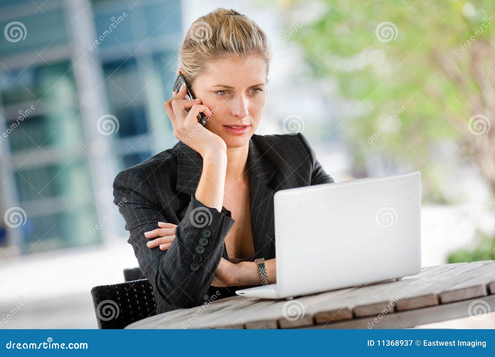 Businesswoman with Phone and Laptop Stock Image - Image of adult ...