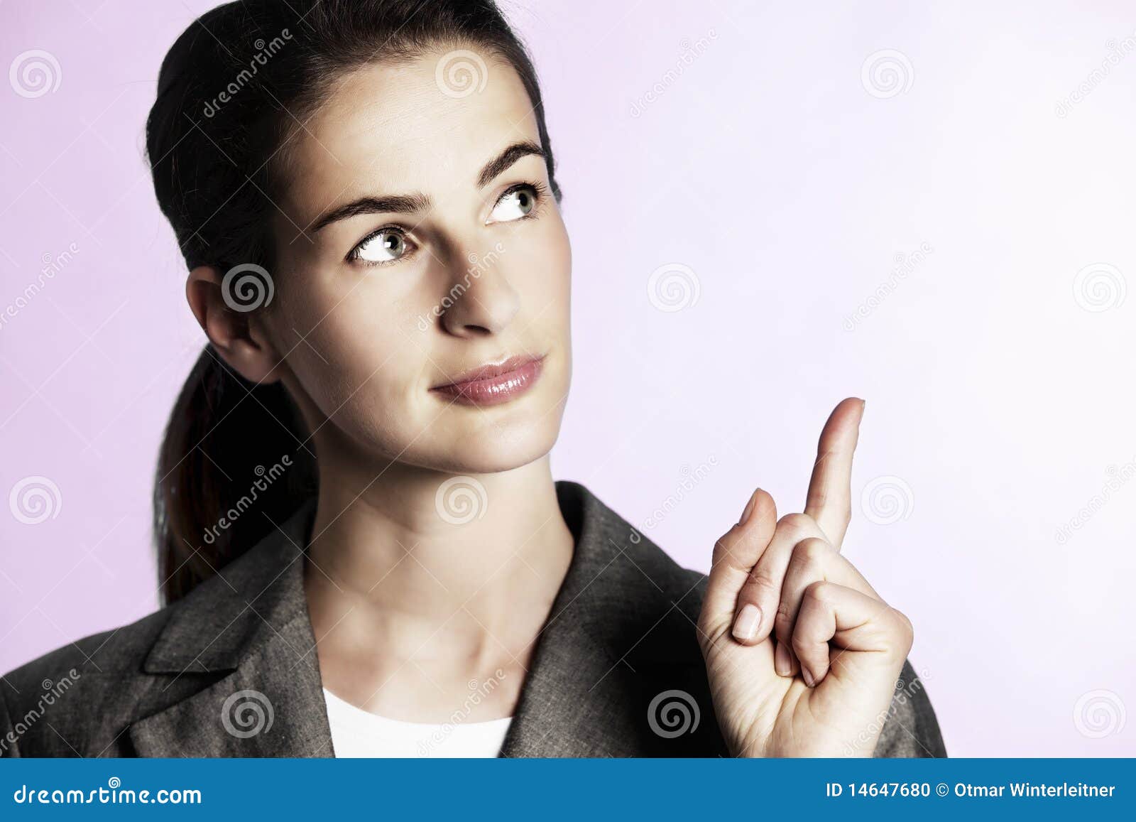 Businesswoman Pointing Upwards. Stock Photo - Image of alertness ...