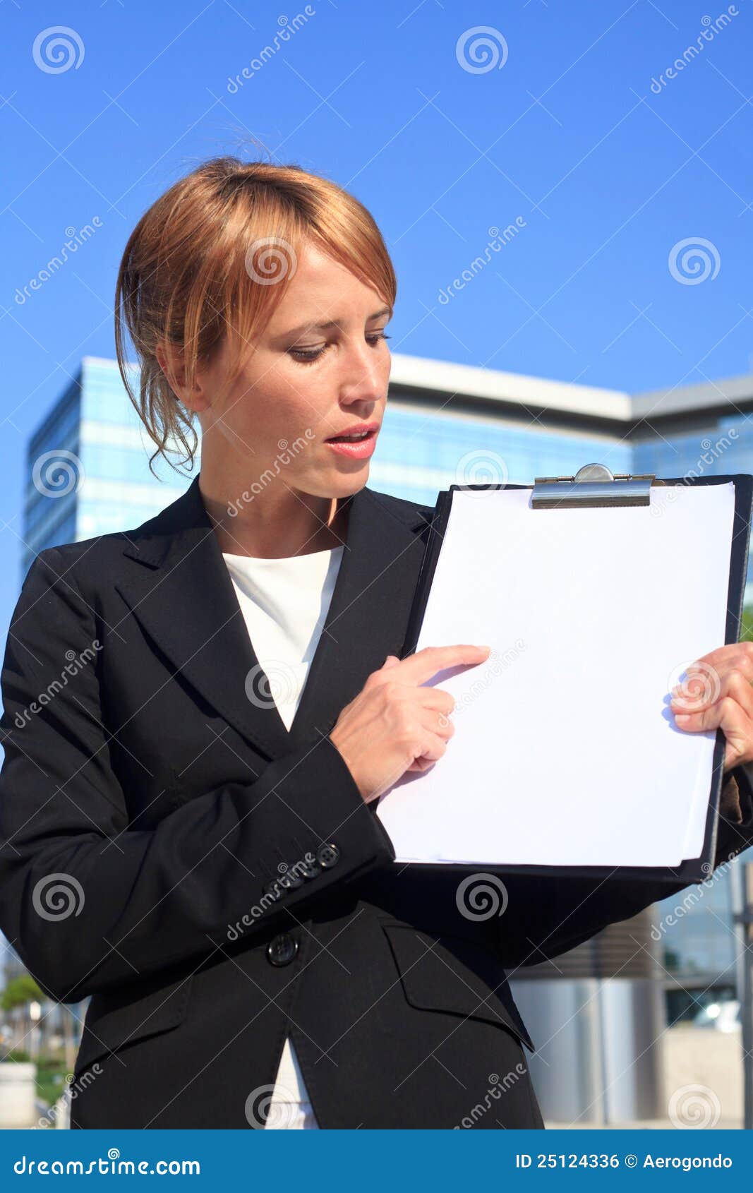 Businesswoman Presenting a Blank Document Stock Photo - Image of ...