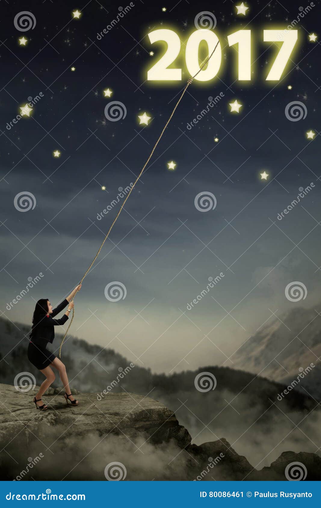 Businesswoman Pulling Number 2017 at the Sky Stock Image - Image of ...