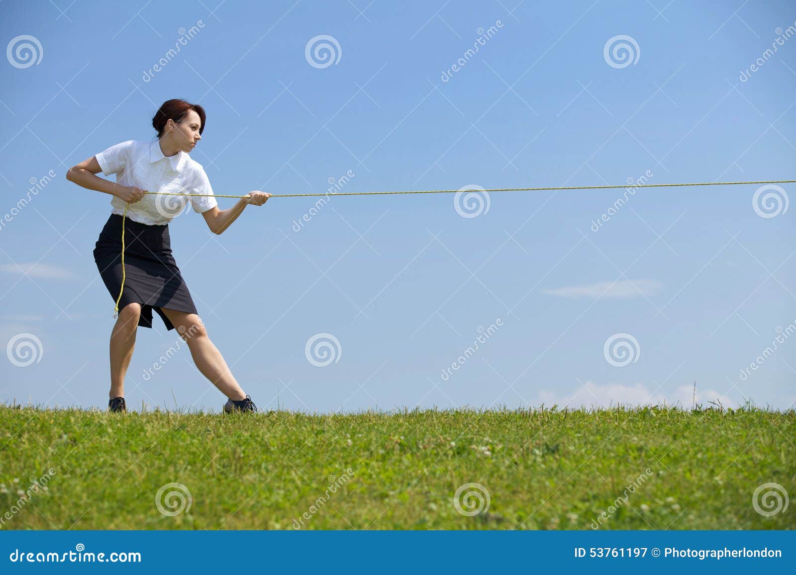 Businesswoman Pulling Rope in Park Stock Image - Image of solitude ...