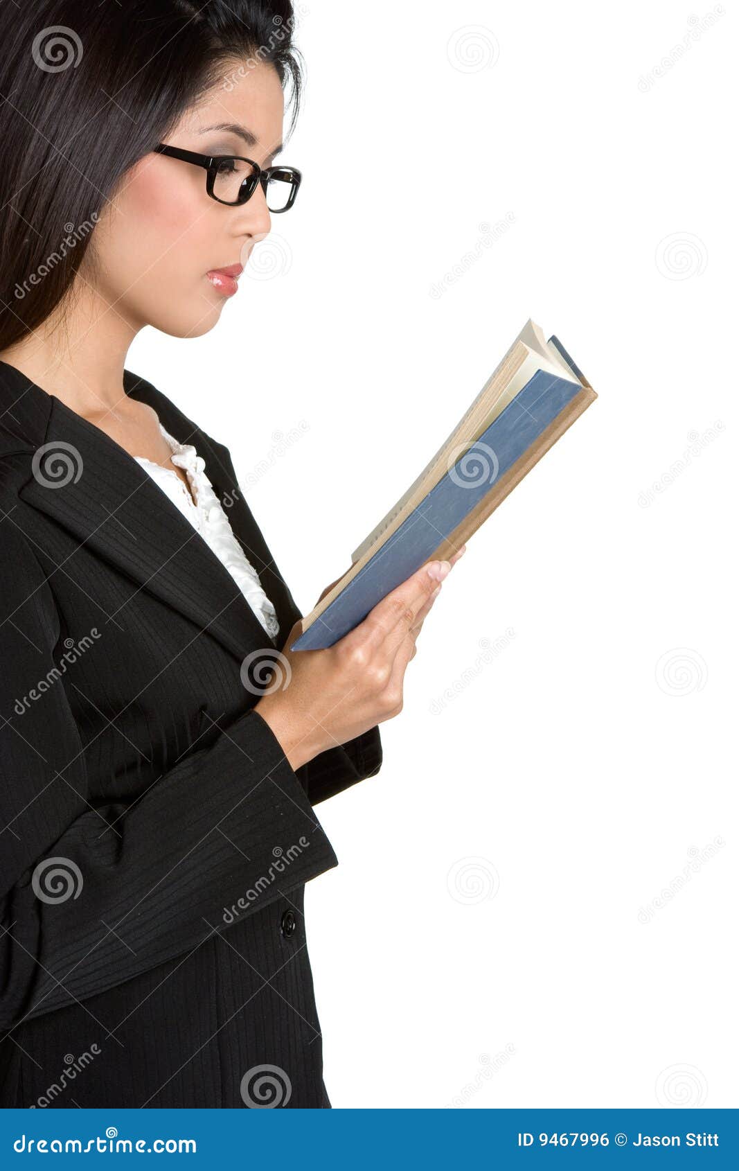 Businesswoman Reading Book stock photo. Image of glasses - 9467996